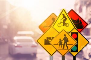 cluster of traffic signs - Wyoming Department of Health